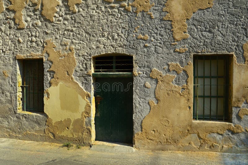 Old Stone Wall with Green Wooden Door and Two Windows Stock Image ...