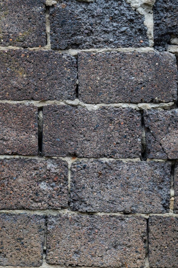 An Old Stone Wall Made of Rectangular Blocks. Stock Photo - Image of ...