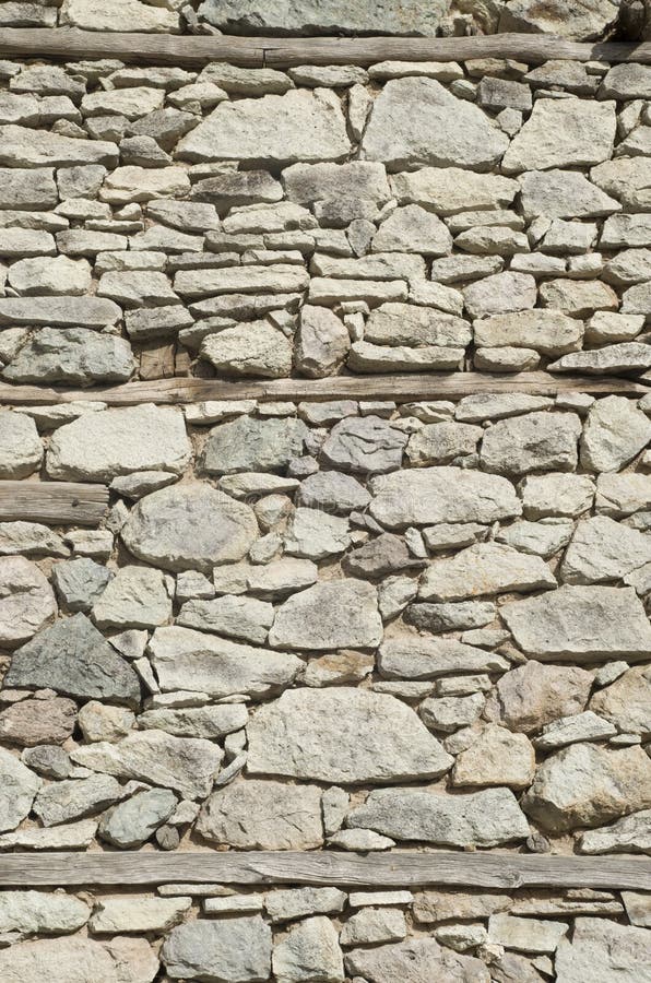 Old Stone Wall with Three Wooden Beams Stock Photo - Image of beams ...