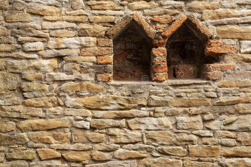 Old Stone Wall with Two Windows. Background Texture. Close-up Stock ...