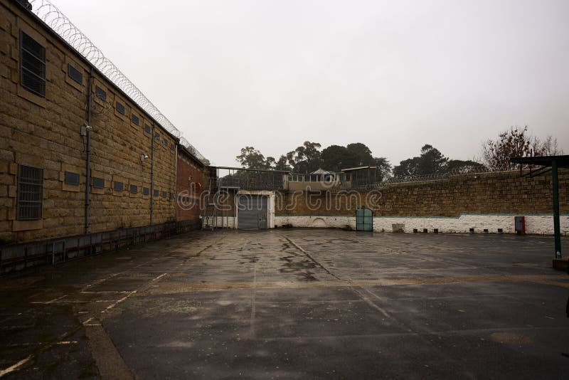 Old Stony Building Facade with Asphalted Yard Stock Image - Image of ...