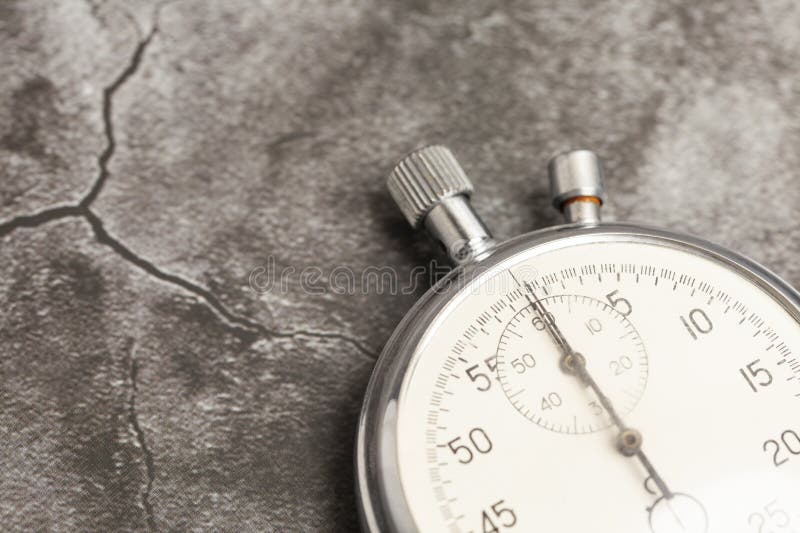 Stopwatch in Hand on a Gray Background Stock Photo - Image of meter ...