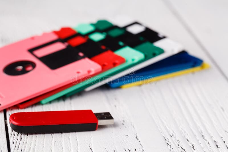 Old Storage Floppy Disk on Wooden Table Versus USB Floppy Driver Stock ...