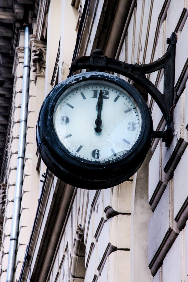 Street Clock on the Facade of the Building Stock Photo - Image of ...