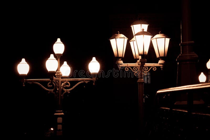 Old Street Electric Lights at Night on Black Background As Little ...