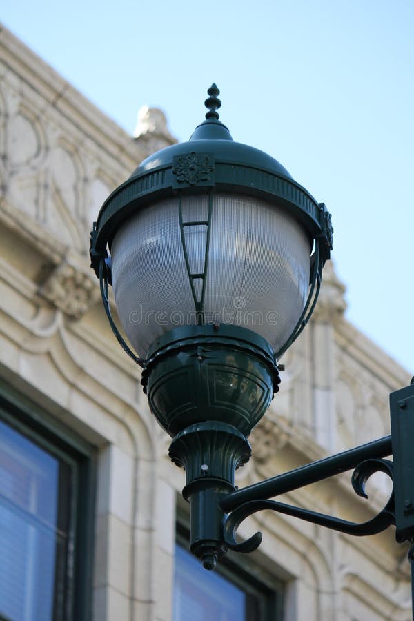 Old street light at a wall stock image. Image of ticino - 34216019
