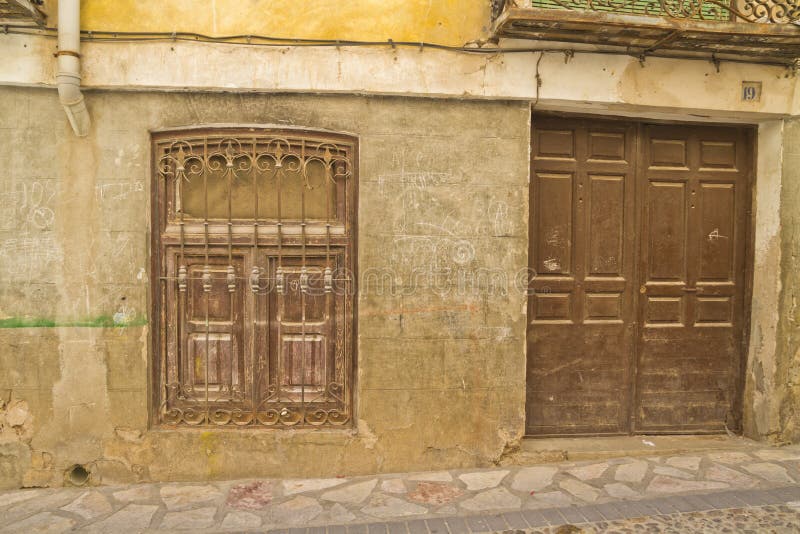 Old Street with Rusty Walls Stock Photo - Image of door, stone: 83089248