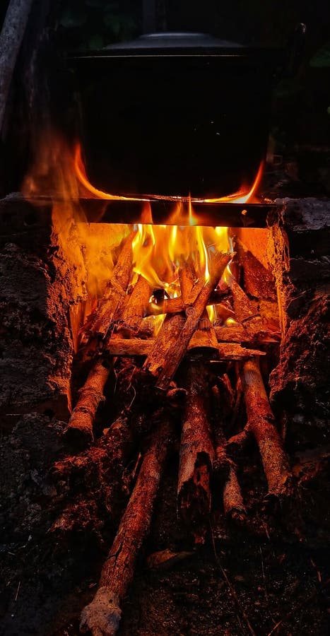 The Old Style of Cooking Uses Firewood Stock Photo - Image of night ...