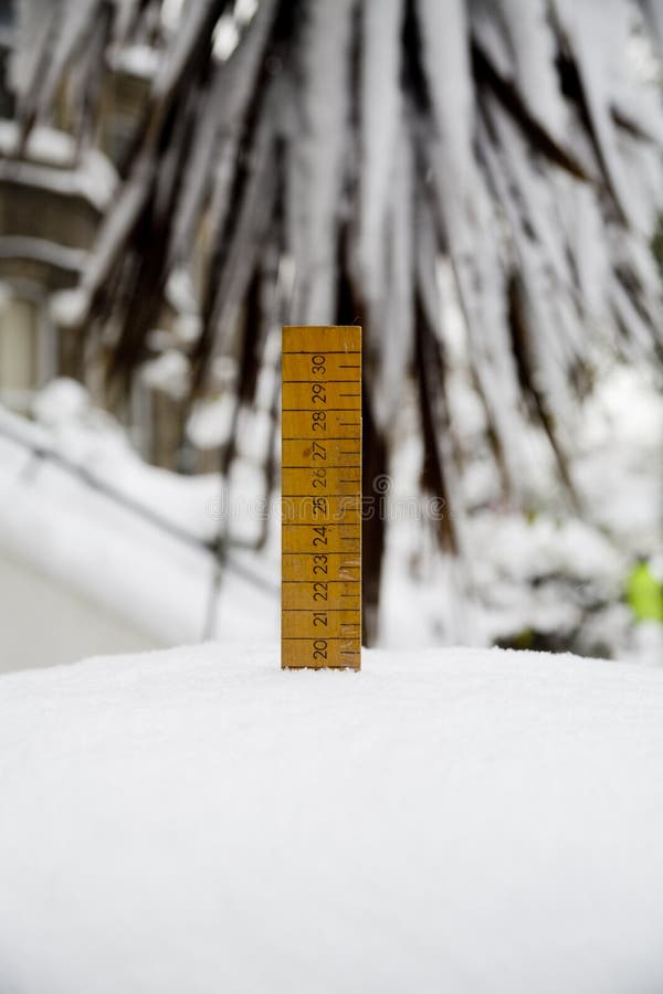 Old Style Ruler Measuring Snow Stock Photo - Image of style, winter ...