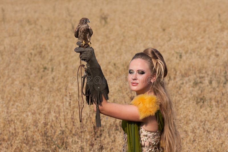 Old Style Woman with Hawk on Hand Stock Photo - Image of beak, majestic ...