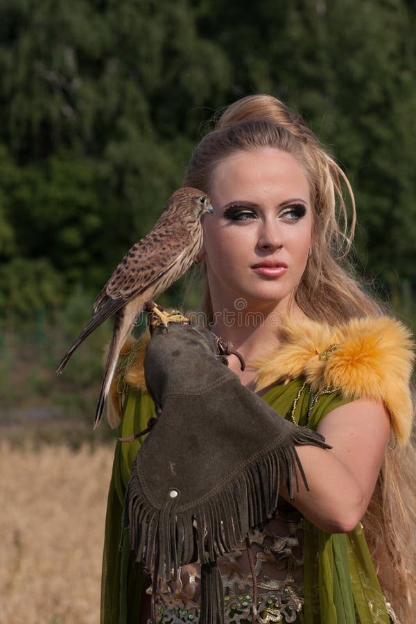 Old Style Woman with Hawk on Hand Stock Photo - Image of beauty, head ...
