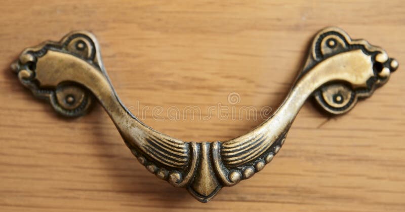 Old-styled drawer handle stock photo. Image of brass - 18656436