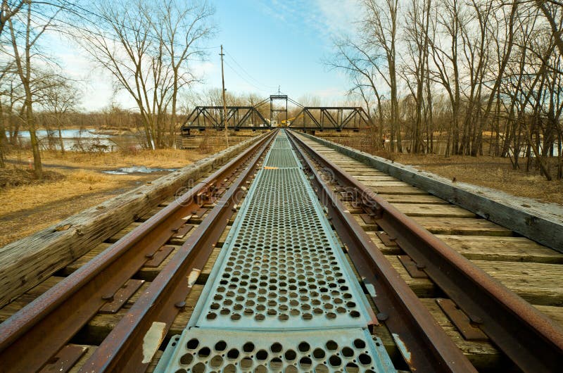 Old Swinging Train Bridge stock image. Image of scene - 23816057