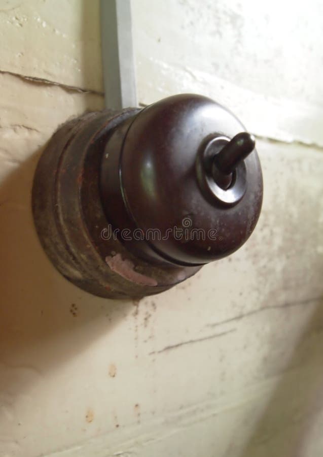 Old switch on the wall stock image. Image of lighting - 176976669