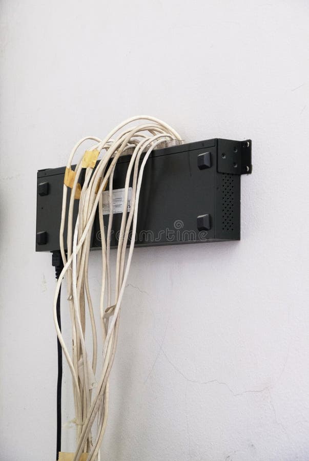 The Old Switching Hub with the Many Lan Cables for Connection Stock ...