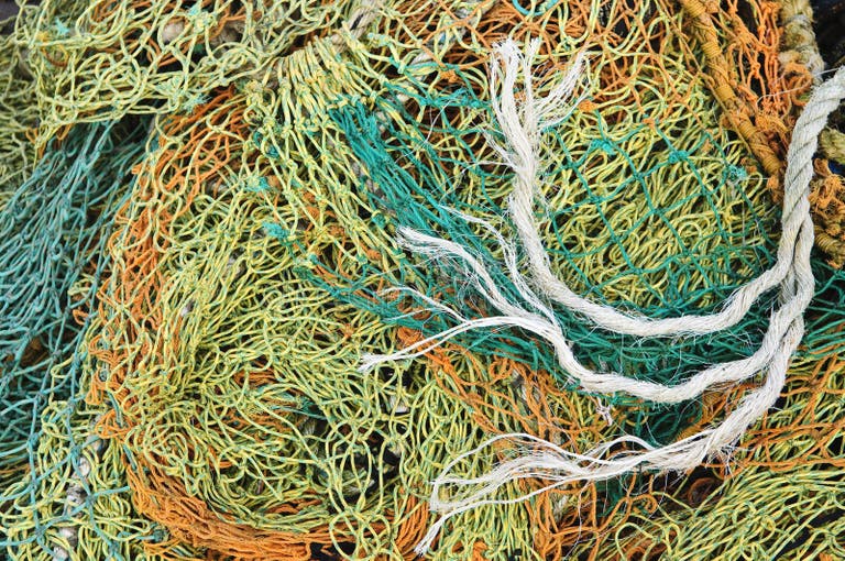 Old tangled fishing nets stock image. Image of colorful - 23284959