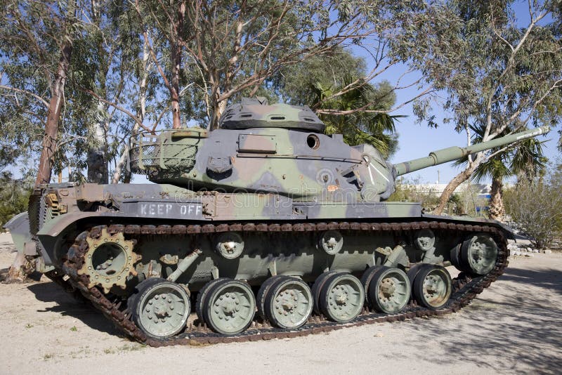 Old Tank stock photo. Image of metal, blue, green, brush - 56959934