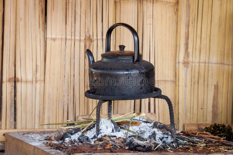Old tea kettle on stove stock image. Image of equipment - 84571379