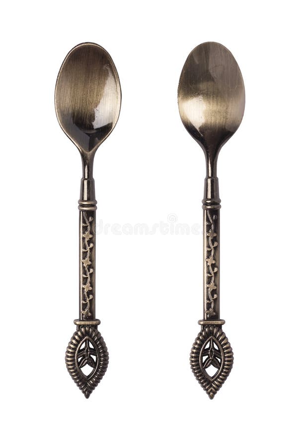 An Old Tea Spoon with a Rich Decorated Handle. on a White Background ...