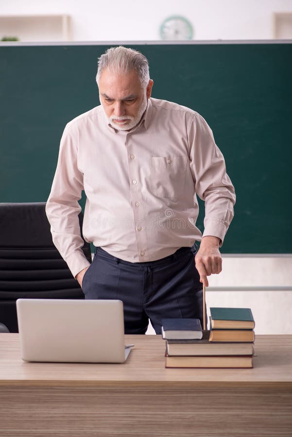 Old Male Teacher in the Classroom Stock Photo - Image of internet ...