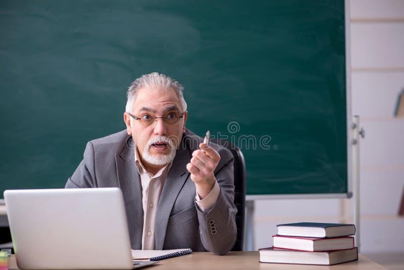 Old Male Teacher in Front of Blackboard Stock Photo - Image of ...
