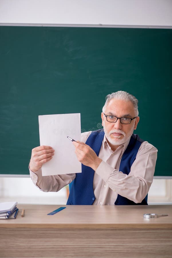 Old Male Teacher in Front of Green Board Stock Image - Image of school ...