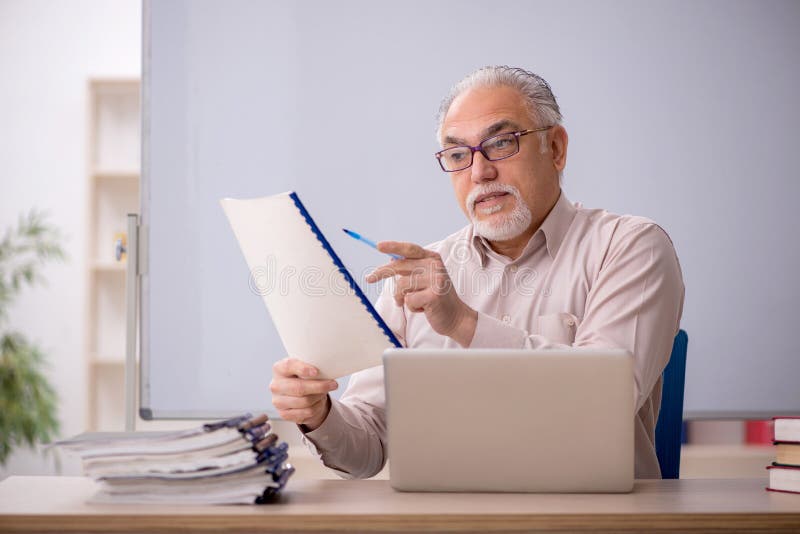 Old Male Teacher in Front of Whiteboard Stock Photo - Image of paper ...