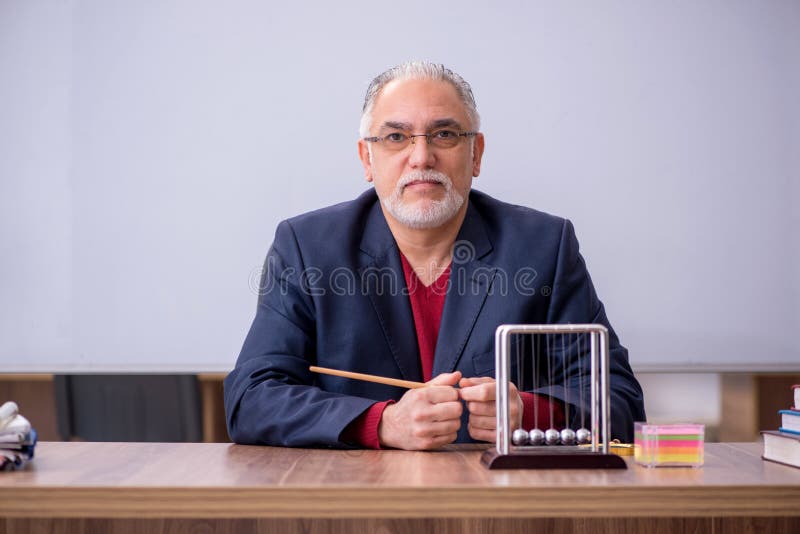 Old Teacher Physicist Sitting in the Classroom Stock Image - Image of ...