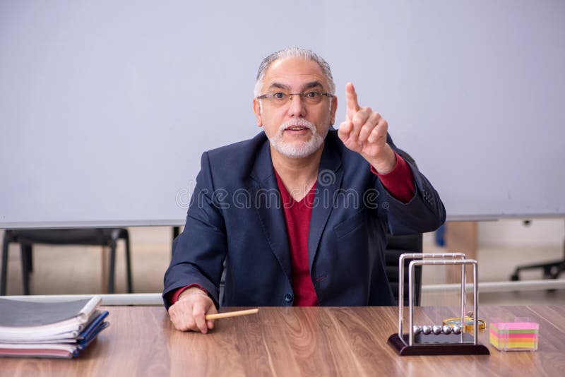 Old Teacher Physicist Sitting in the Classroom Stock Image - Image of ...