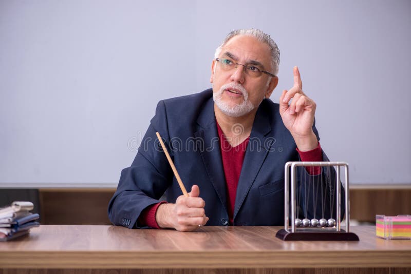 Old Teacher Physicist Sitting in the Classroom Stock Photo - Image of ...