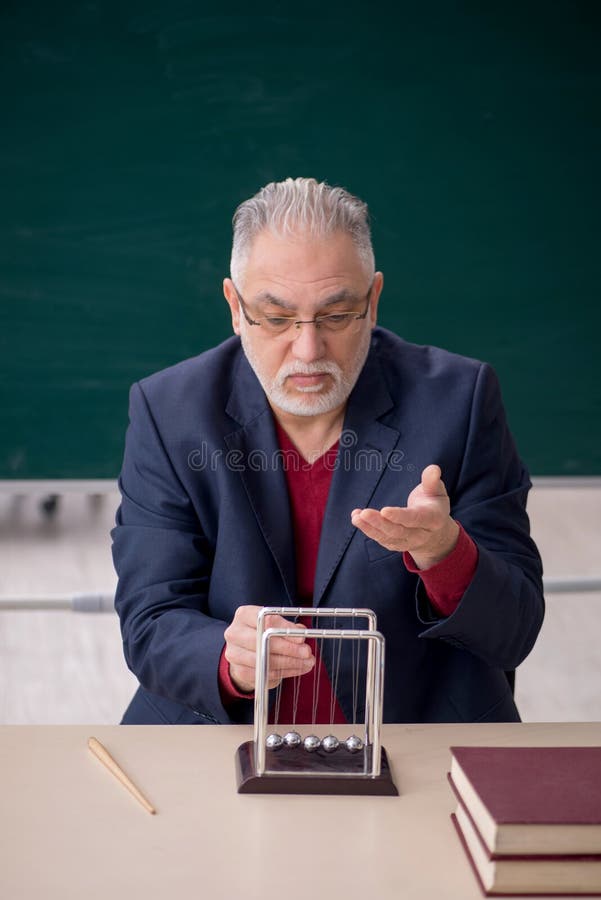Old Male Teacher Physicist Sitting in the Classroom Stock Image - Image ...