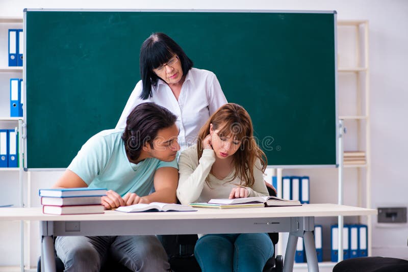 Old Teacher and Students in the Classroom Stock Photo - Image of ...