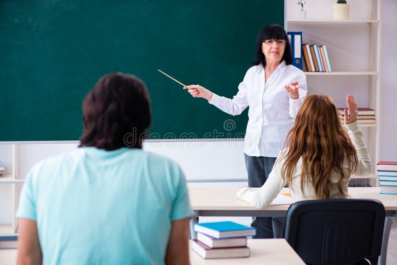 Old Teacher and Students in the Classroom Stock Image - Image of high ...