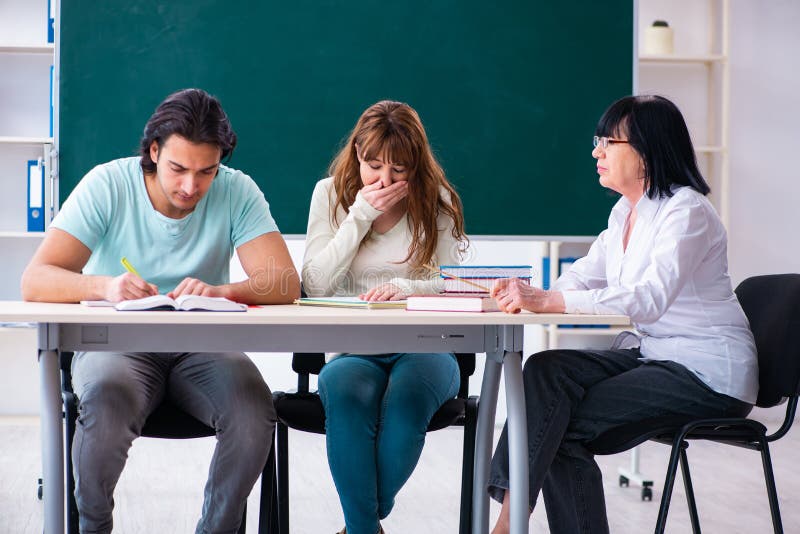 Old Teacher and Students in the Classroom Stock Image - Image of ...