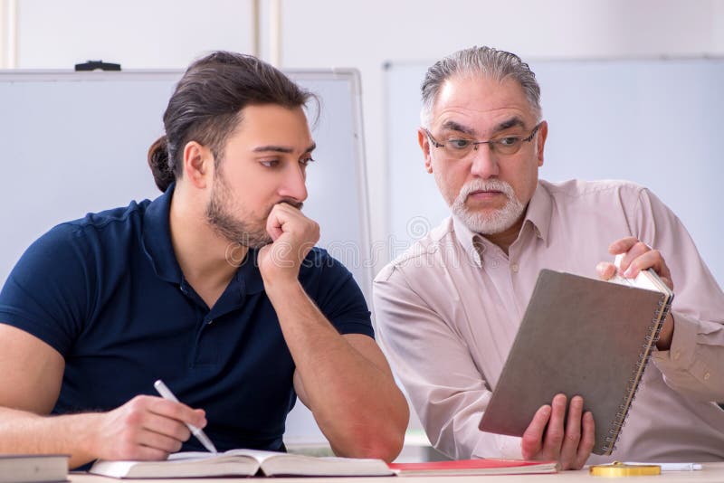 Old Teacher and Young Male Student in the Classroom Stock Image - Image ...