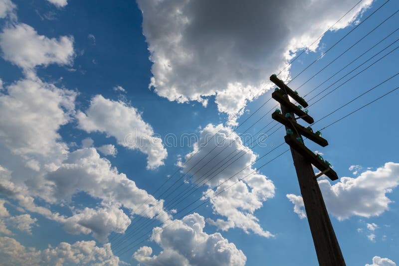 Old Telegraph Pole, Profiled on Sky with Cumulus Clouds, on a Bright ...