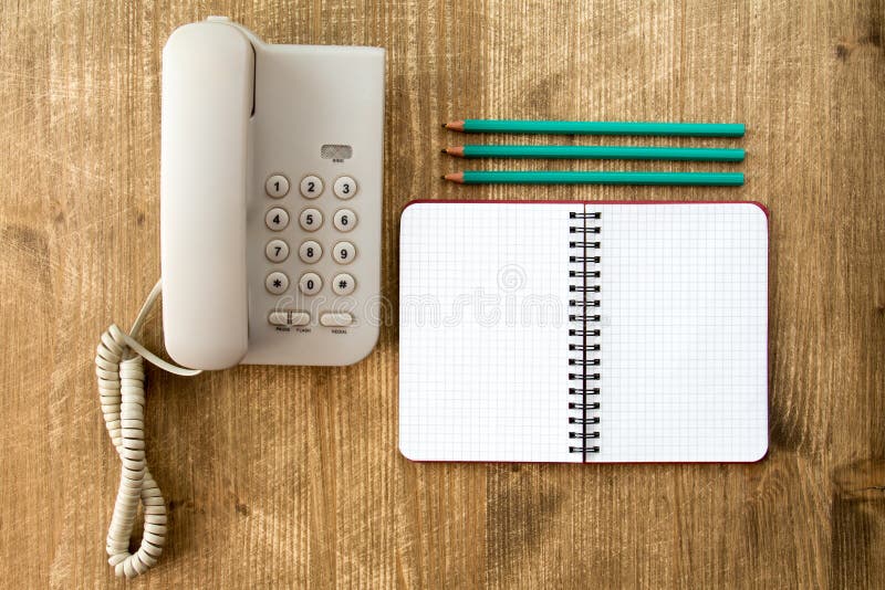 Old Telephone,blank Notebook and Three Pencils Stock Photo - Image of ...