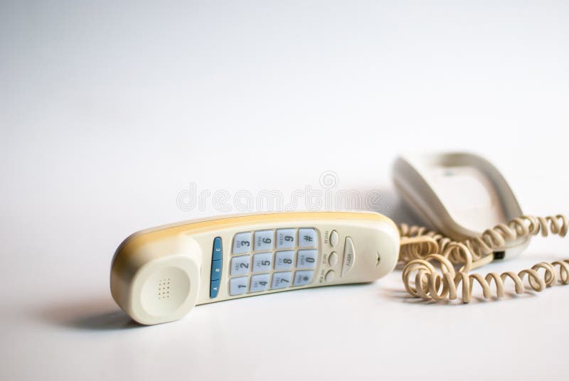 Old Telephone with the Earphone in the Front of the Frame, in a ...