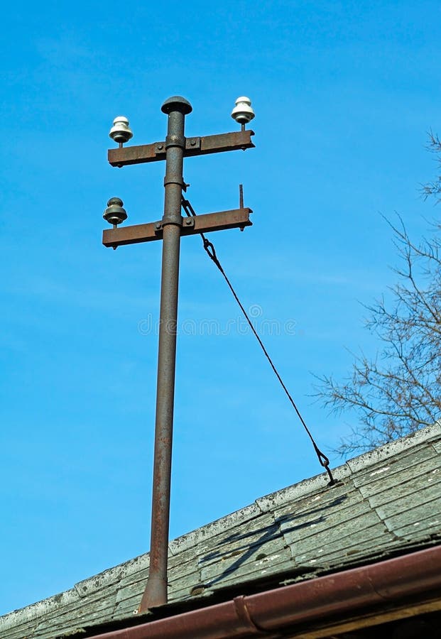Old Telephone Pole on the Roof Stock Photo - Image of cable, green ...