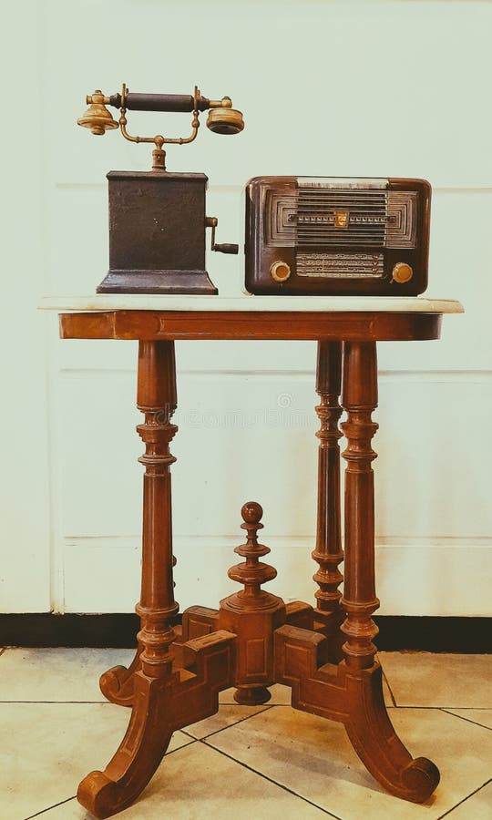 An Old Telephone and Radio on the Table Stock Photo - Image of table ...