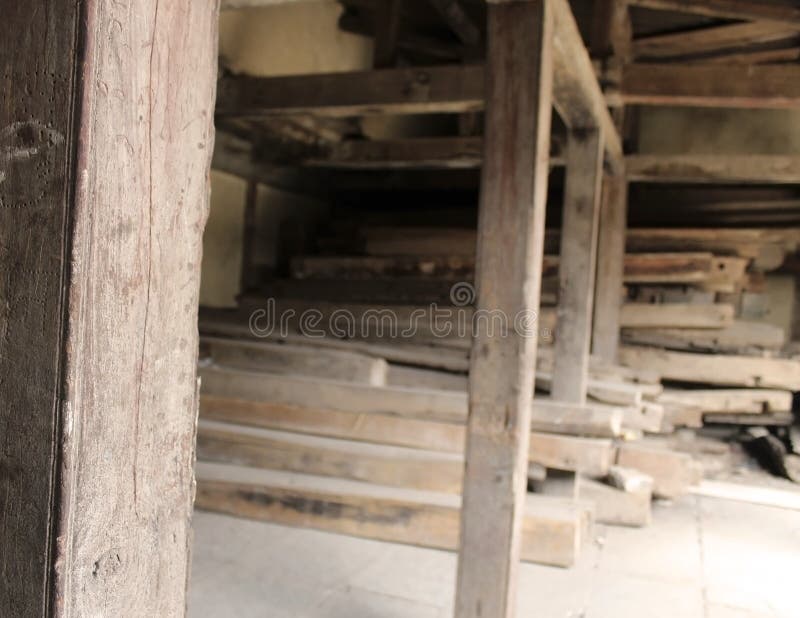 Old Timber Stocked Next To Strong Pillars Stock Image - Image of ...