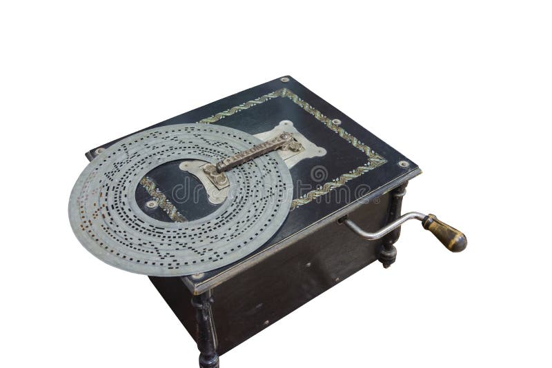 Old-time Music Box in a Black Wooden Box with Perforated Metal Disc on ...