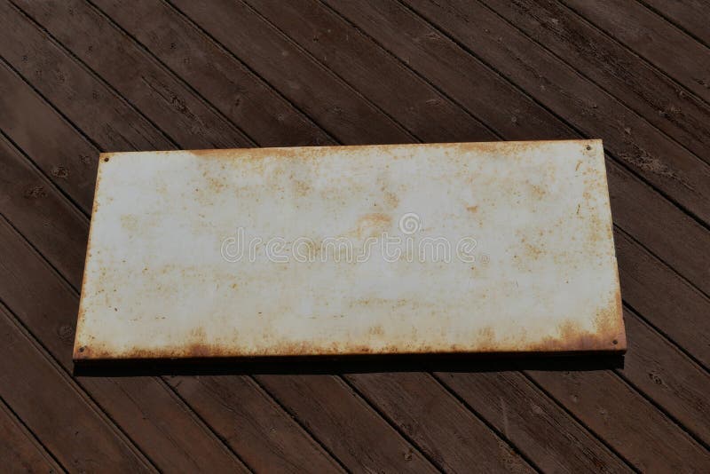 Old Tin Sign for Text Template on an Old Wooden Wall Stock Photo ...