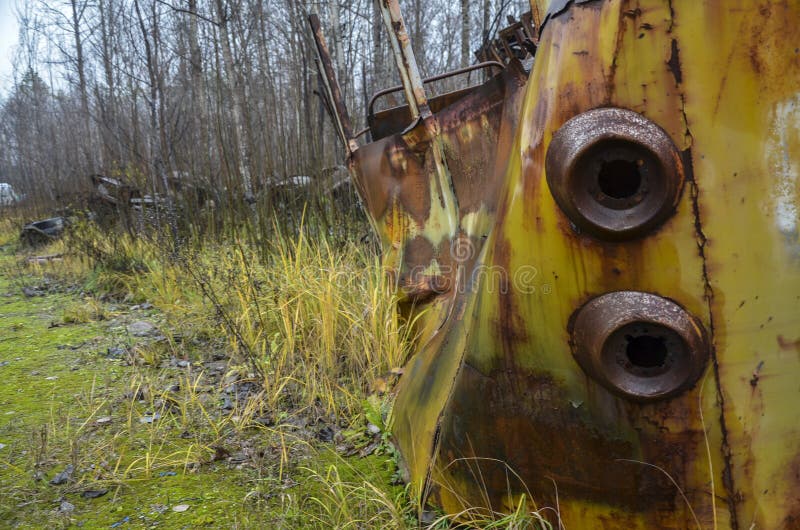 Old Tired Smashed Used Automotive Equipment With Broken Headlights In A
