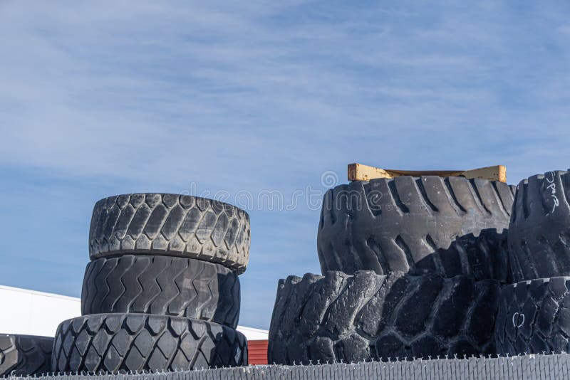 Old Tires Stacked Up Together at a Car Workshop Garage Stock Image ...