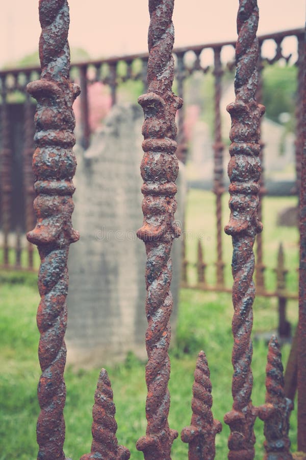Old Tombstone Behid Rusty Fence Stock Image - Image of gothic, symbol ...