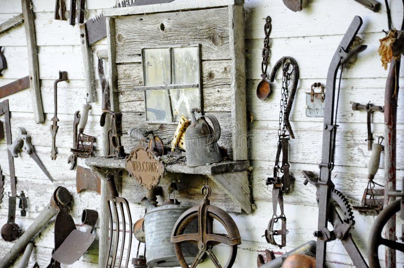 Old Tools Hanging on a Wall Stock Image - Image of garage, rusty: 154550005
