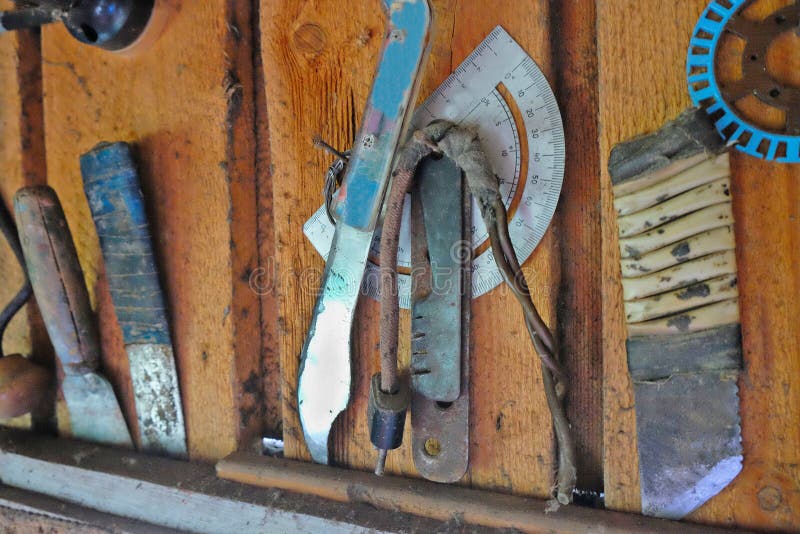 Old tools on the wall stock image. Image of messy, home - 77245351