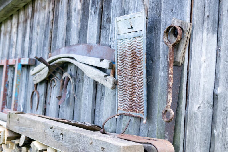 Old tools on a wall stock image. Image of washboard, iron - 77533743