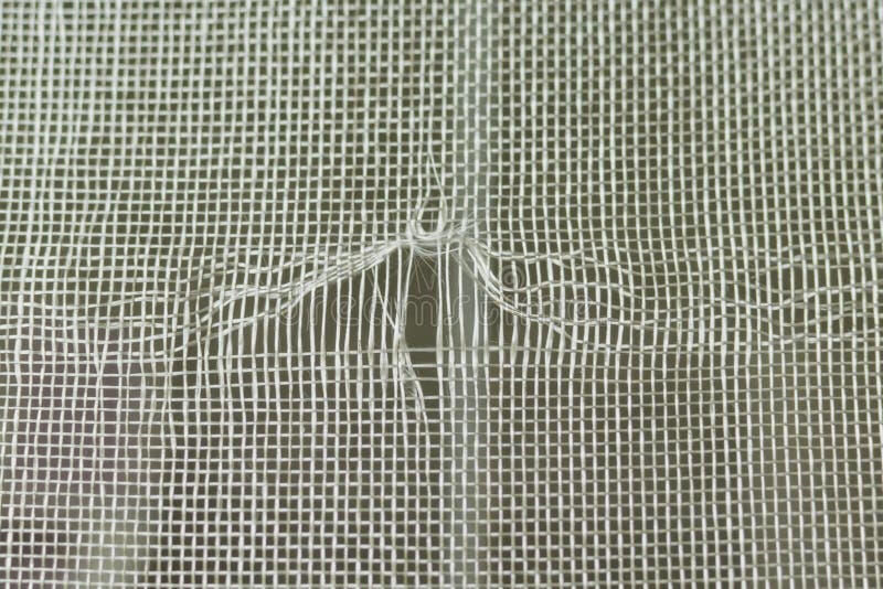 Old torn mosquito net stock photo. Image of retro, pattern - 166127478